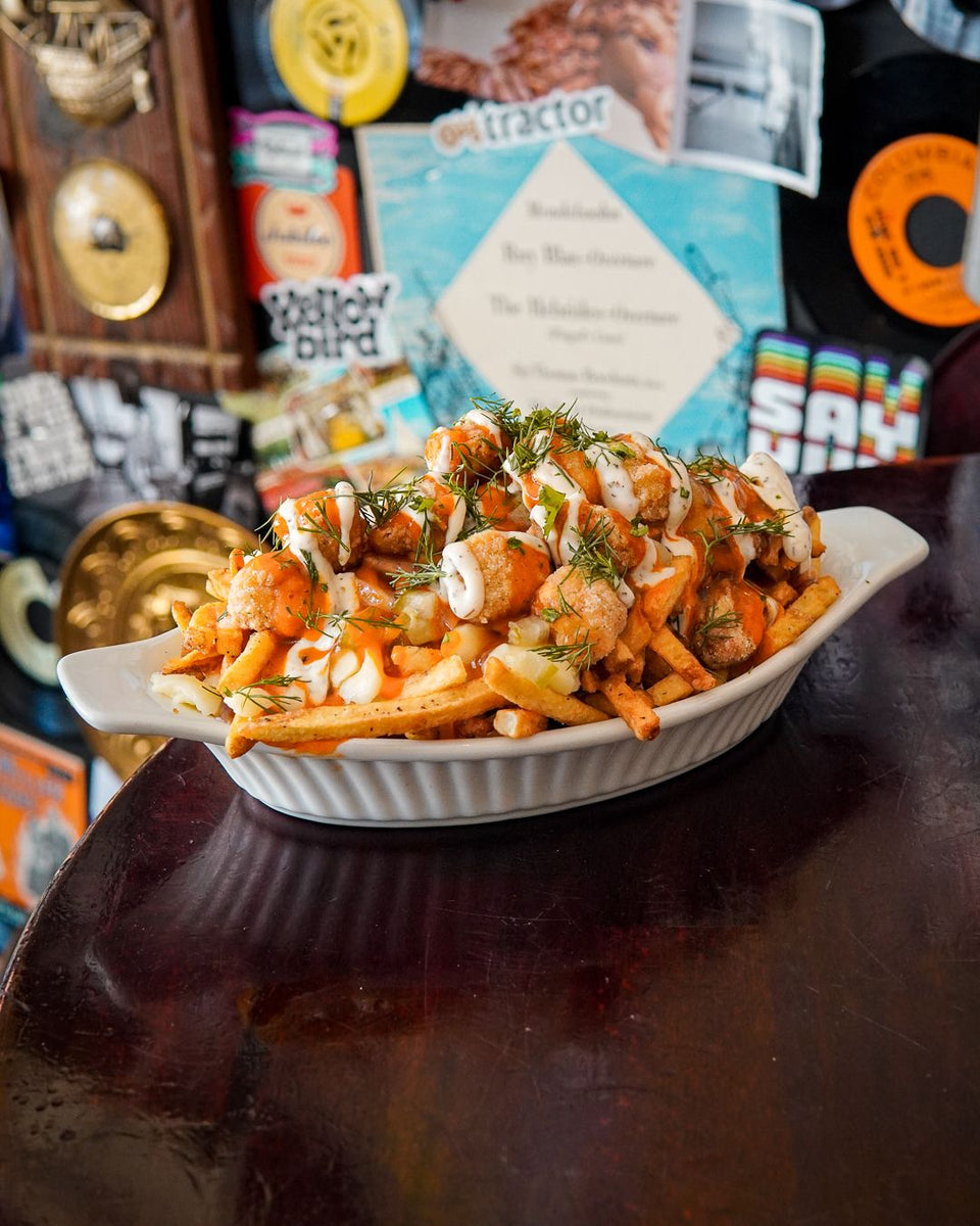 Extreme Pickle Popcorn Chicken Poutine (December 1-7) – Leopold's Tavern