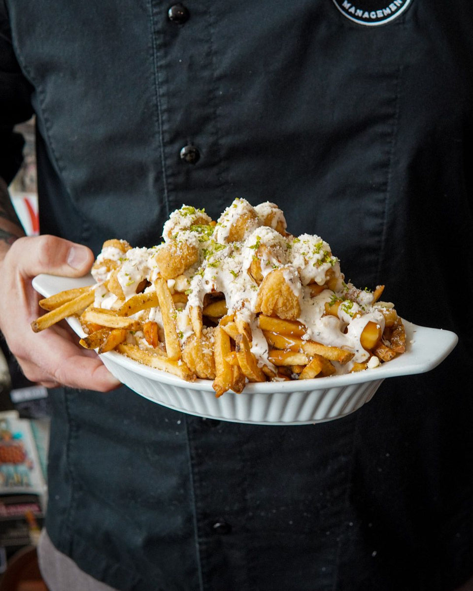 Garlic Parm Popcorn Chicken Poutine (October 14 - 19) – Leopold's Tavern