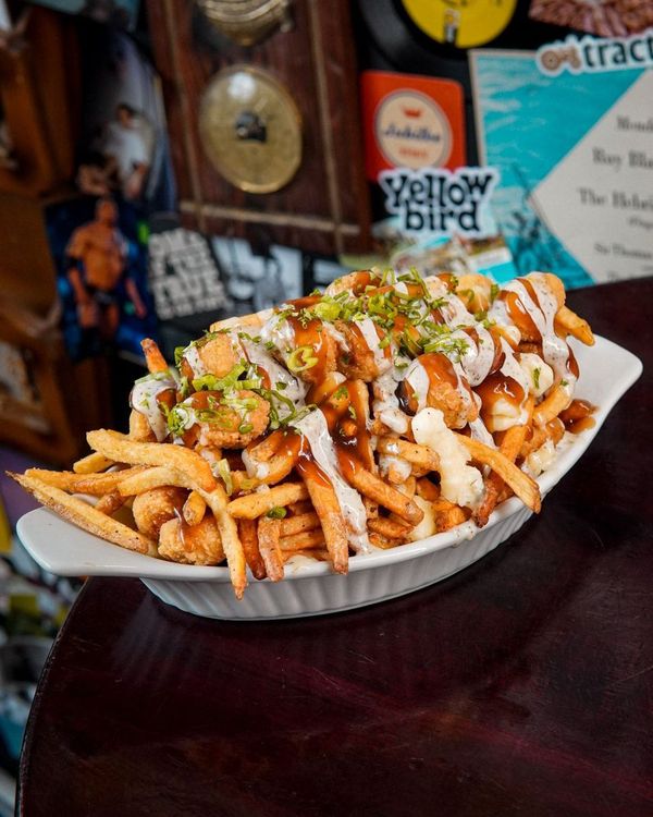 Honey Dill Popcorn Chicken Poutine (July 21 - 27) – Leopold's Tavern
