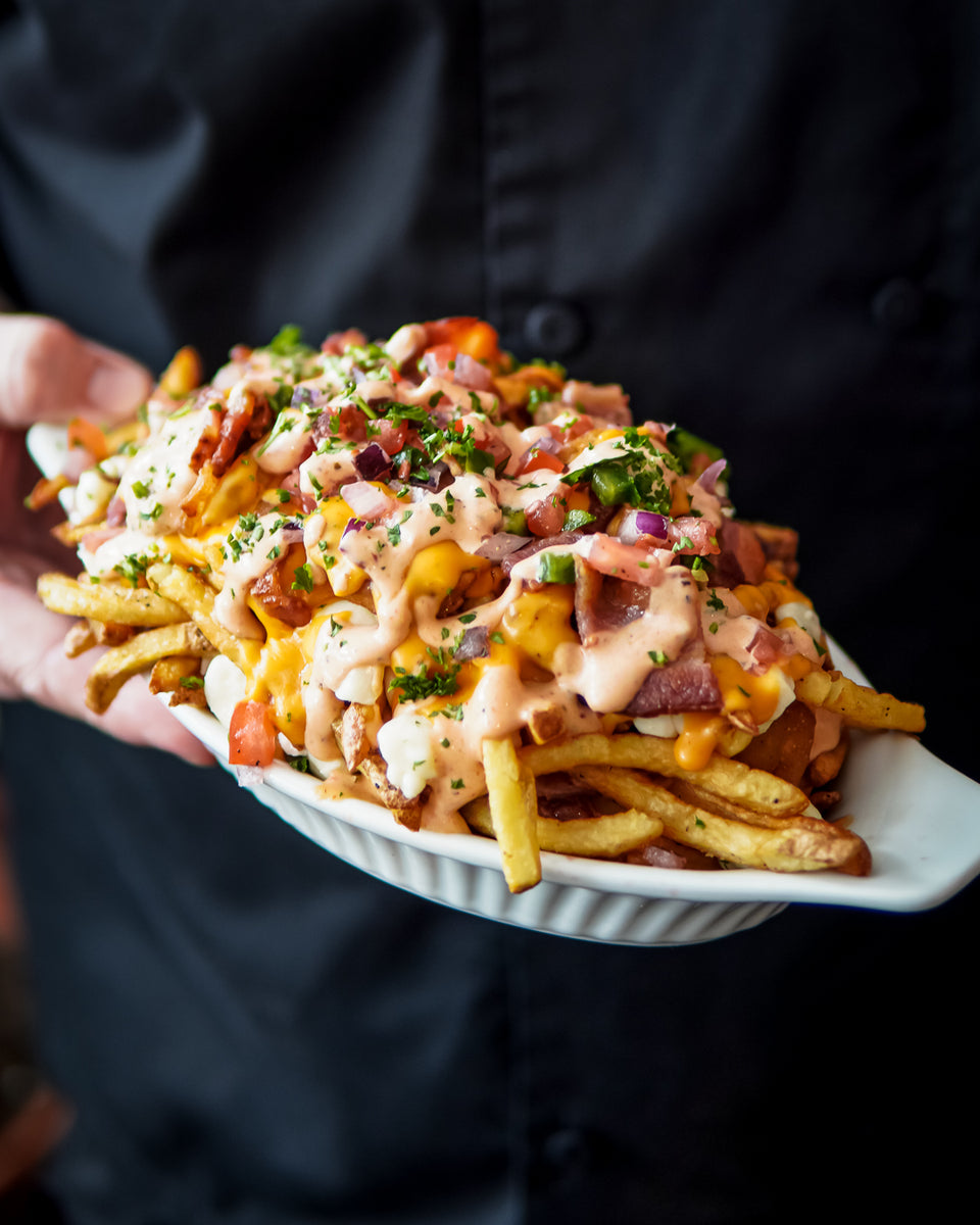 Bacon Jalapeno Popper Poutine (March 4-10) – Leopold's Tavern