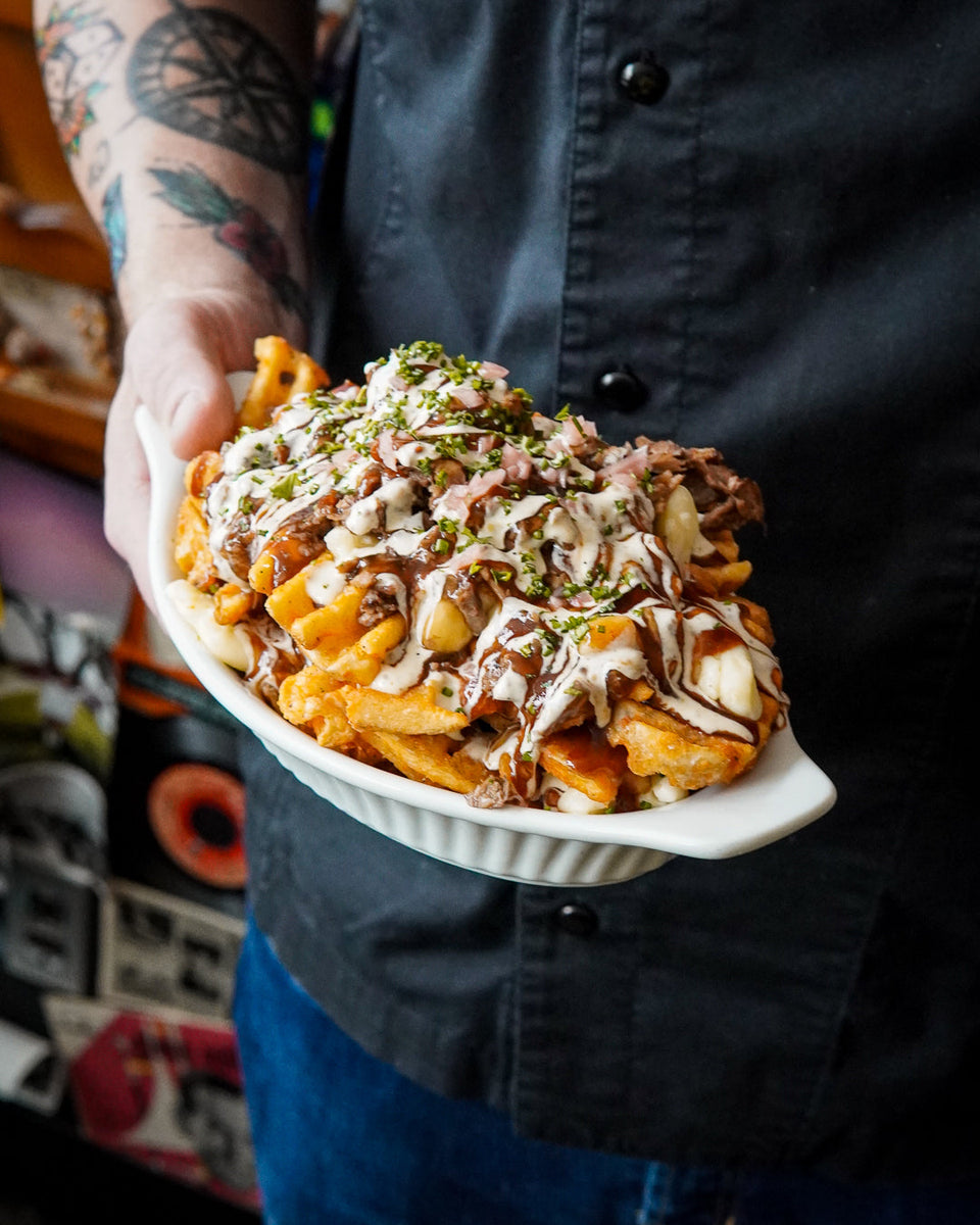 Loaded Guinness Braised Beef Poutine (March 10-16) – Leopold's Tavern