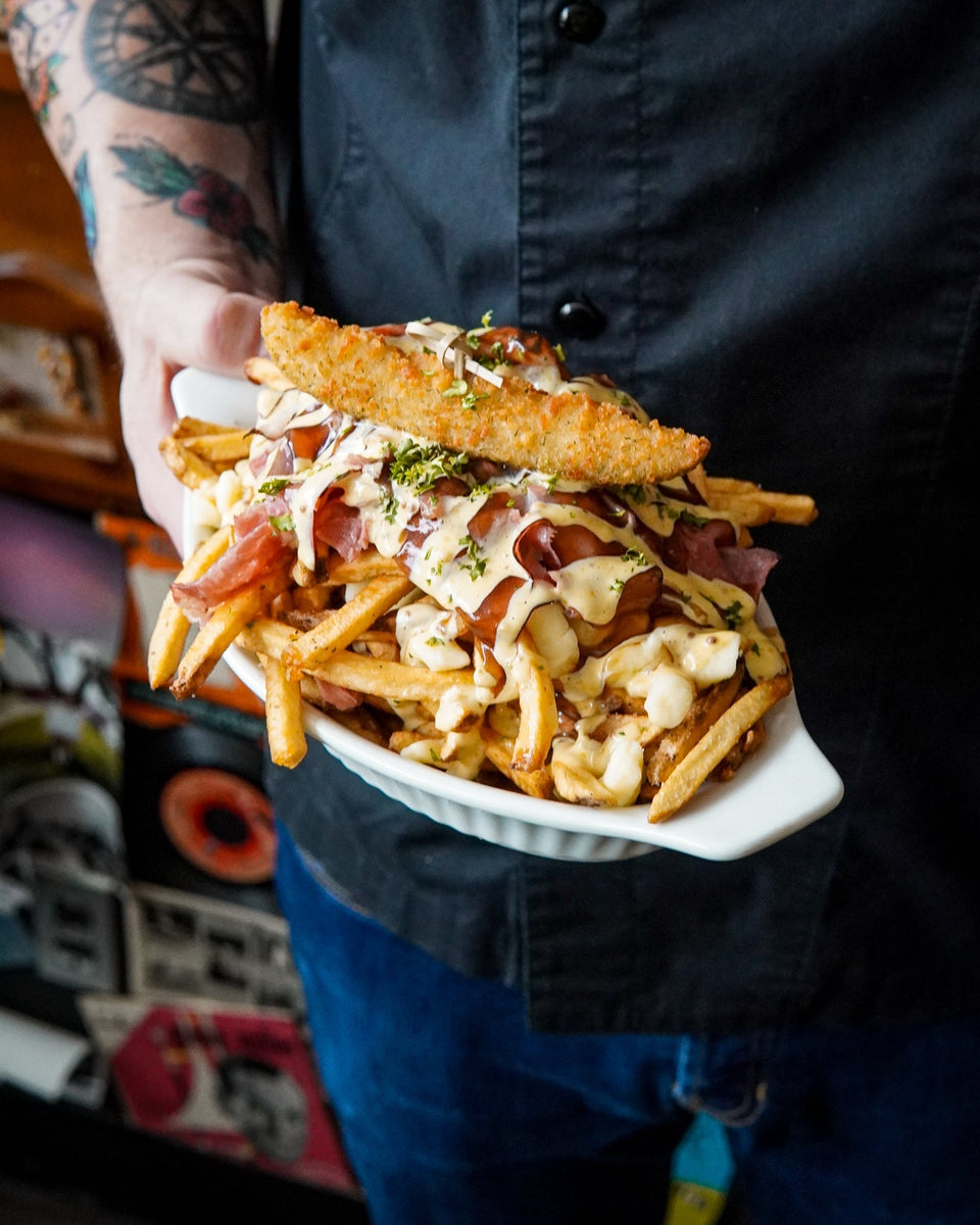 Montreal Smoked Meat Poutine (March 17-23) – Leopold's Tavern