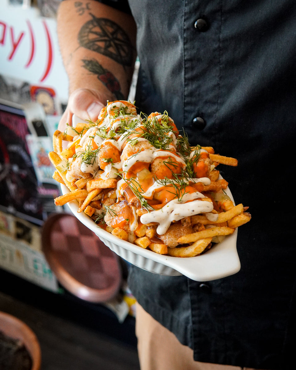 Extreme Pickle Popcorn Chicken Poutine (Sept. 2-8) – Leopold's Tavern